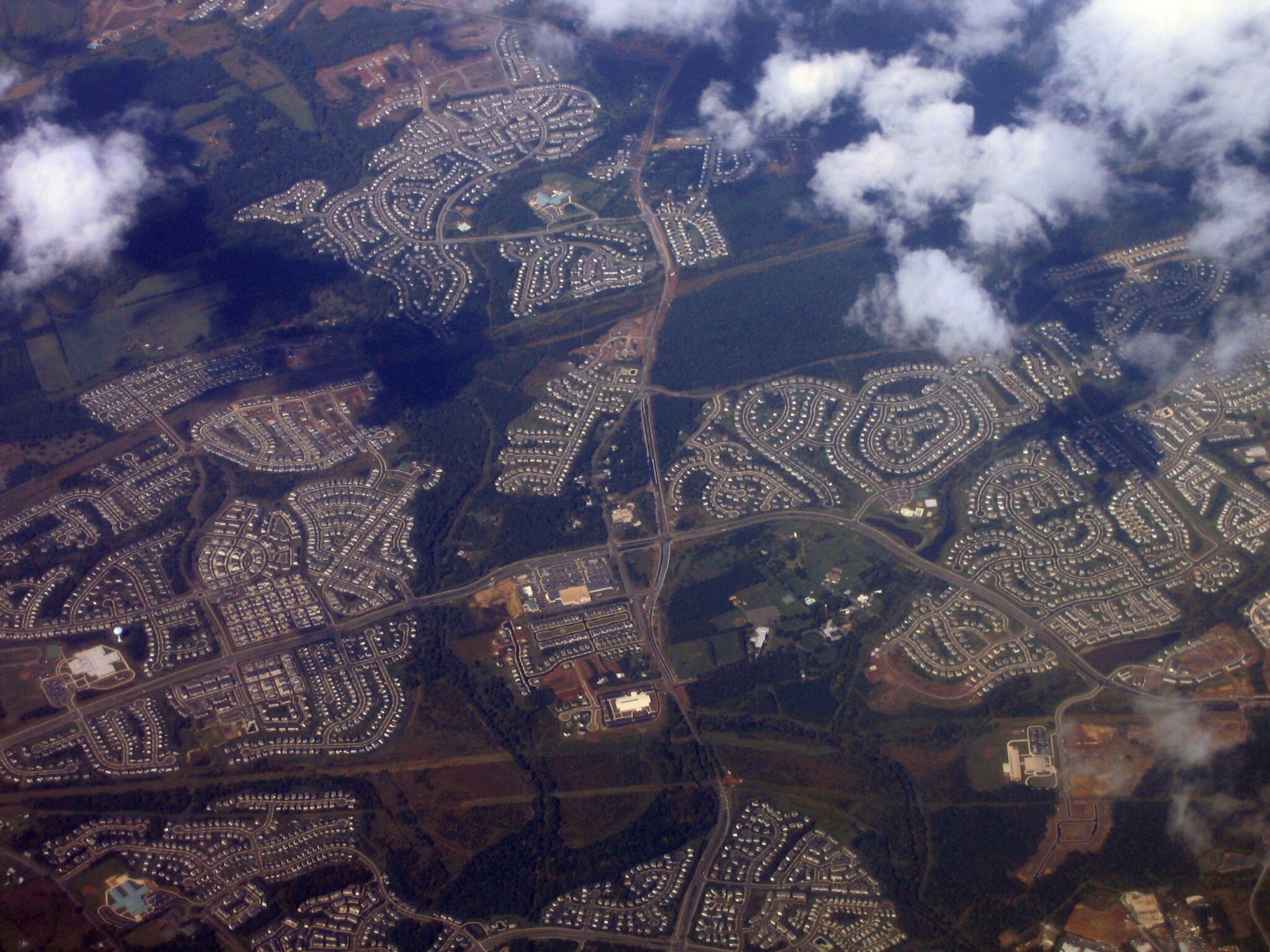 Paving over paradise: How sprawl destroys our farms and forests and how ...